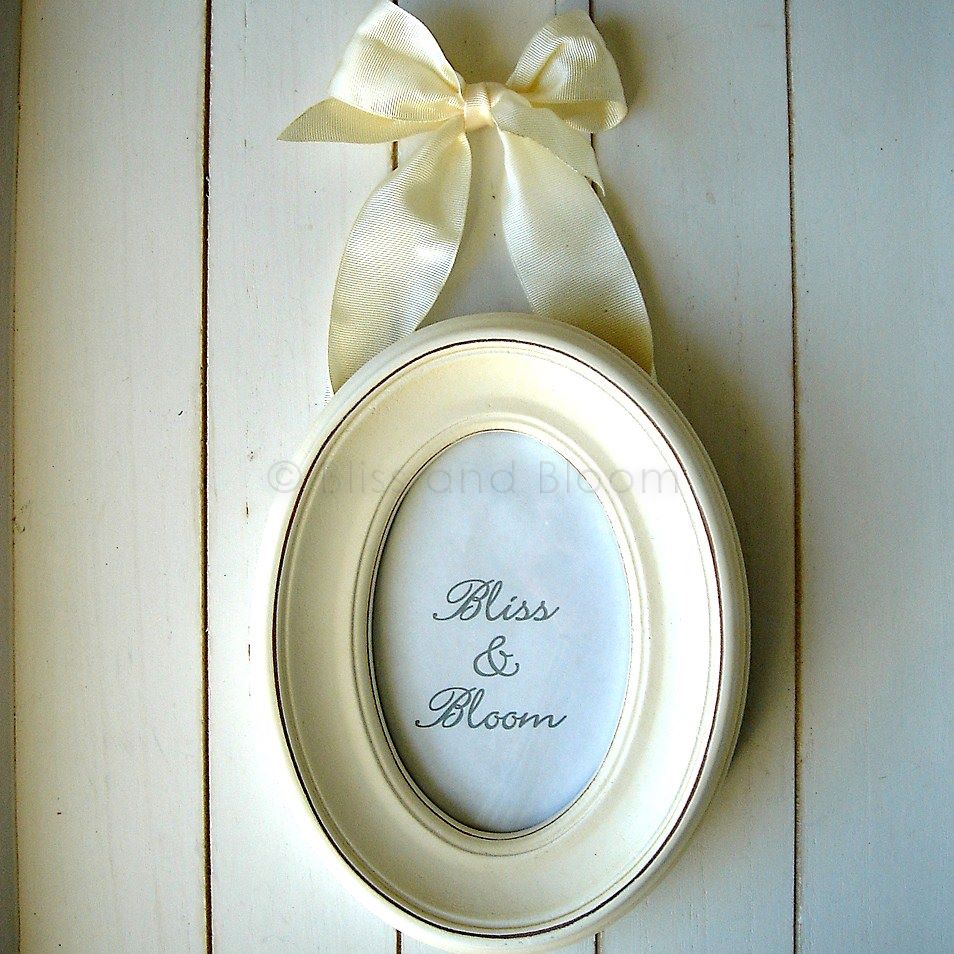 Cream oval frame with bow | Bliss and Bloom